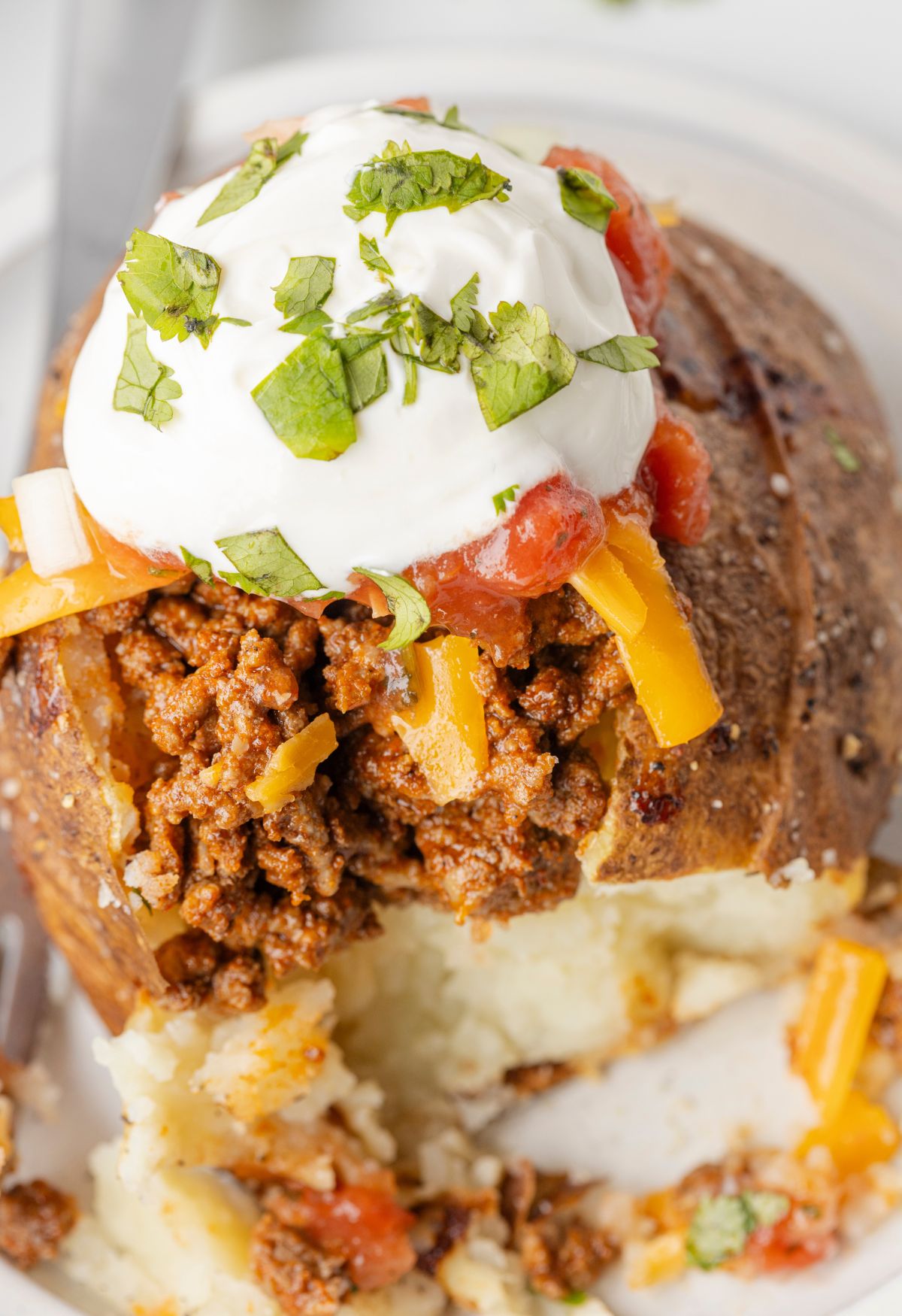 Taco Potatoes (Taco Stuffed Baked Potato) - Together as Family