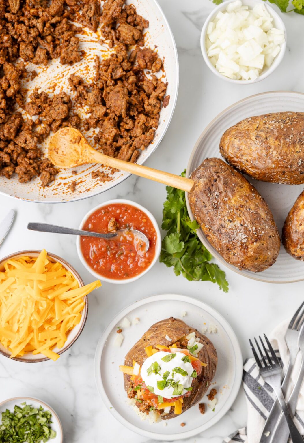 Taco Potatoes (Taco Stuffed Baked Potato) - Together as Family