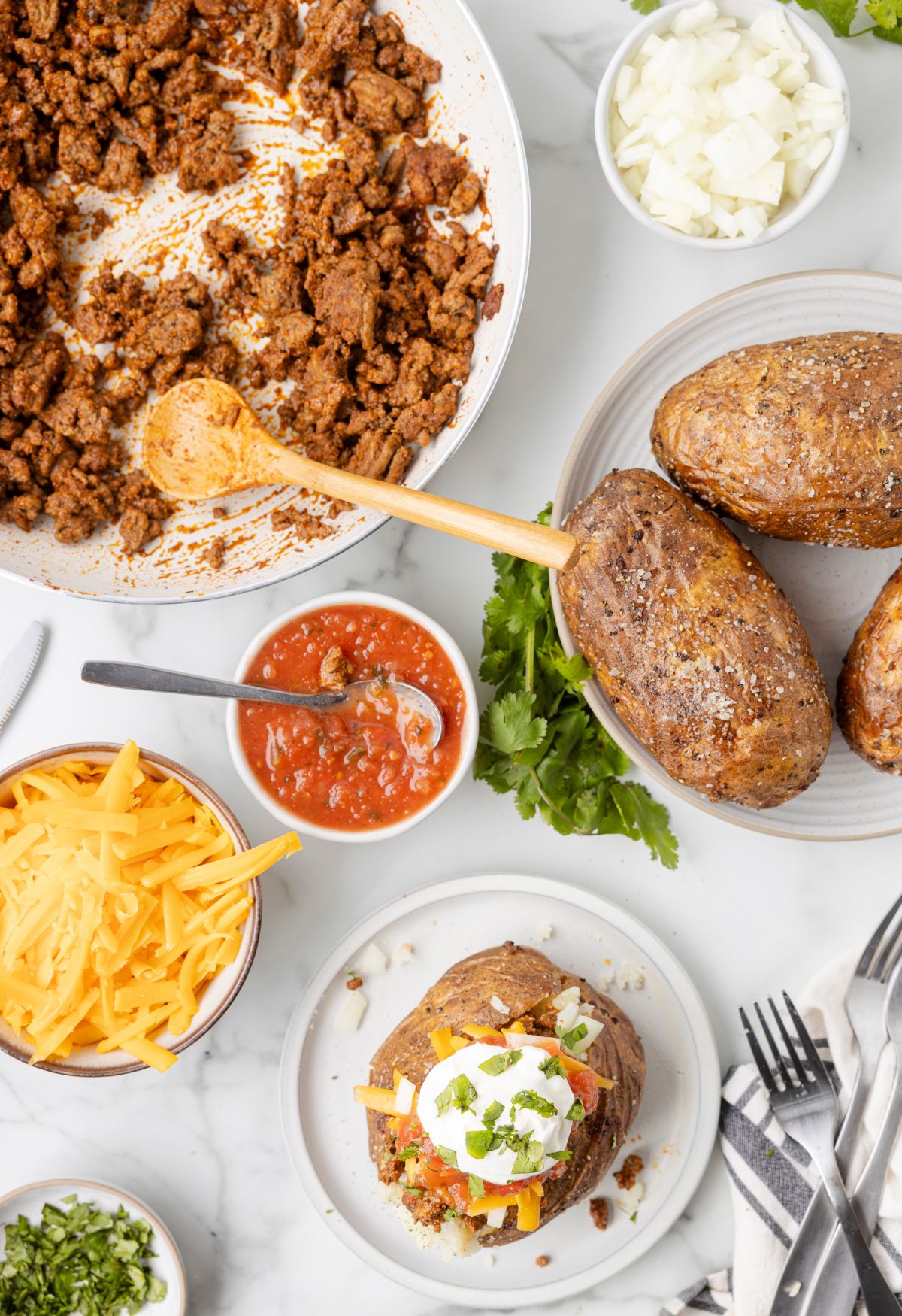 Taco Potatoes (Taco Stuffed Baked Potato) - Together as Family