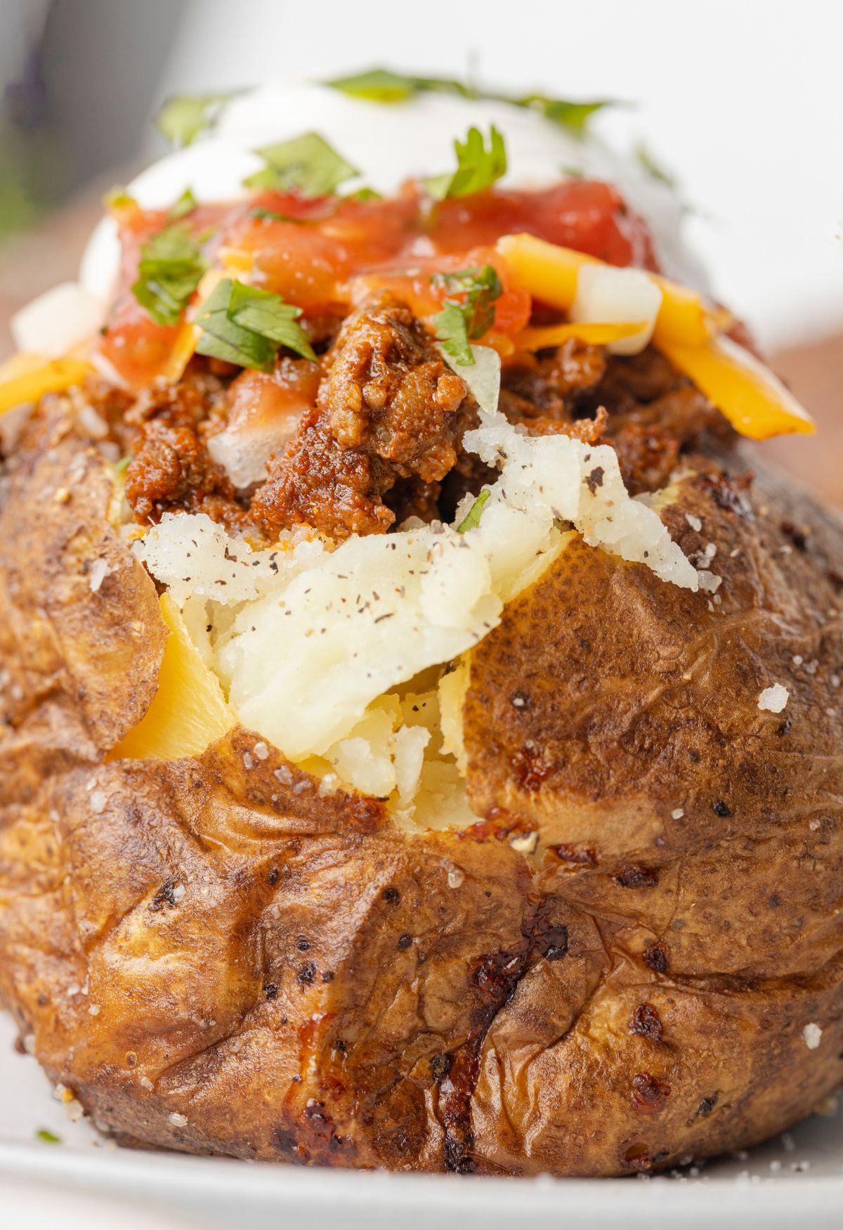 Taco Potatoes (Taco Stuffed Baked Potato) - Together as Family