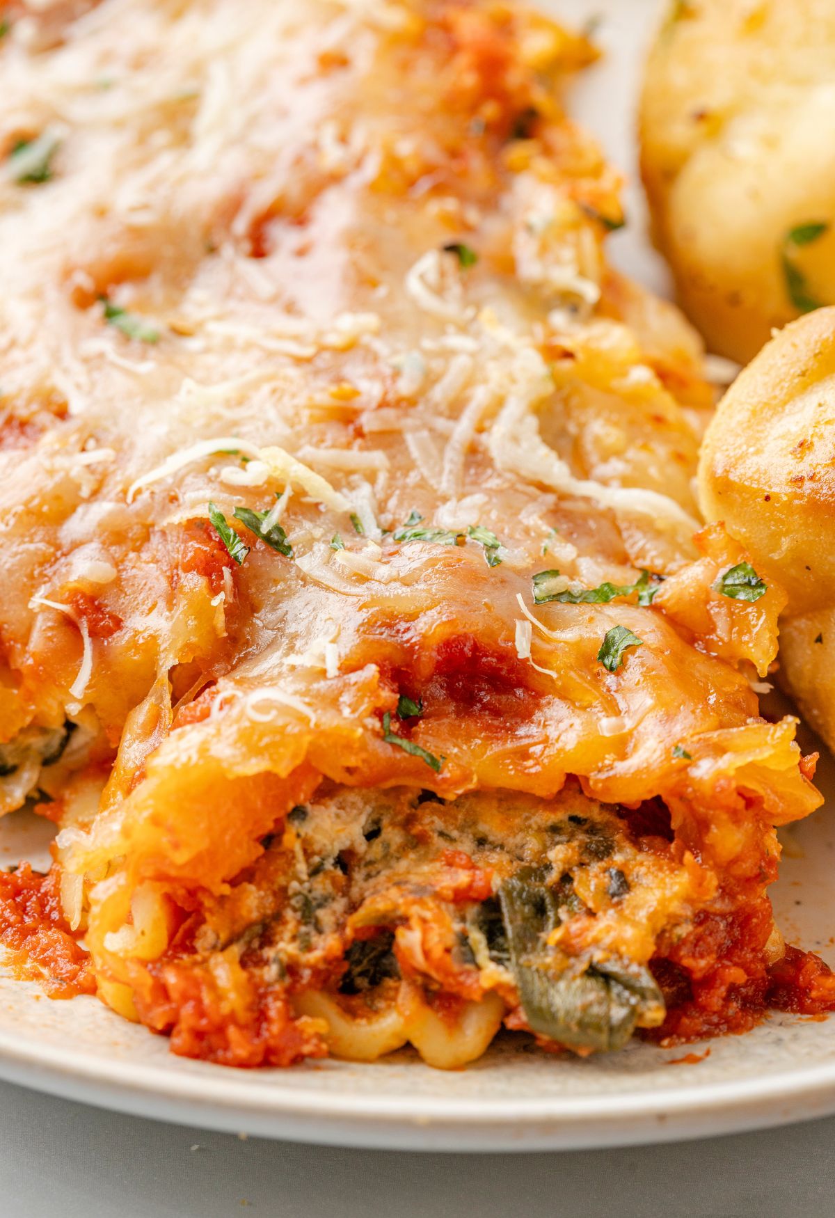 Spinach and Ricotta Cheese Stuffed Manicotti - Together as Family