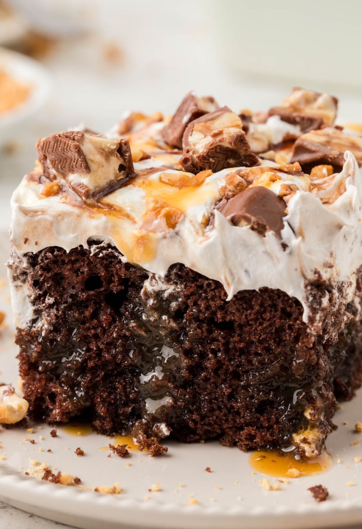 Easy Snickers Poke Cake - Together as Family