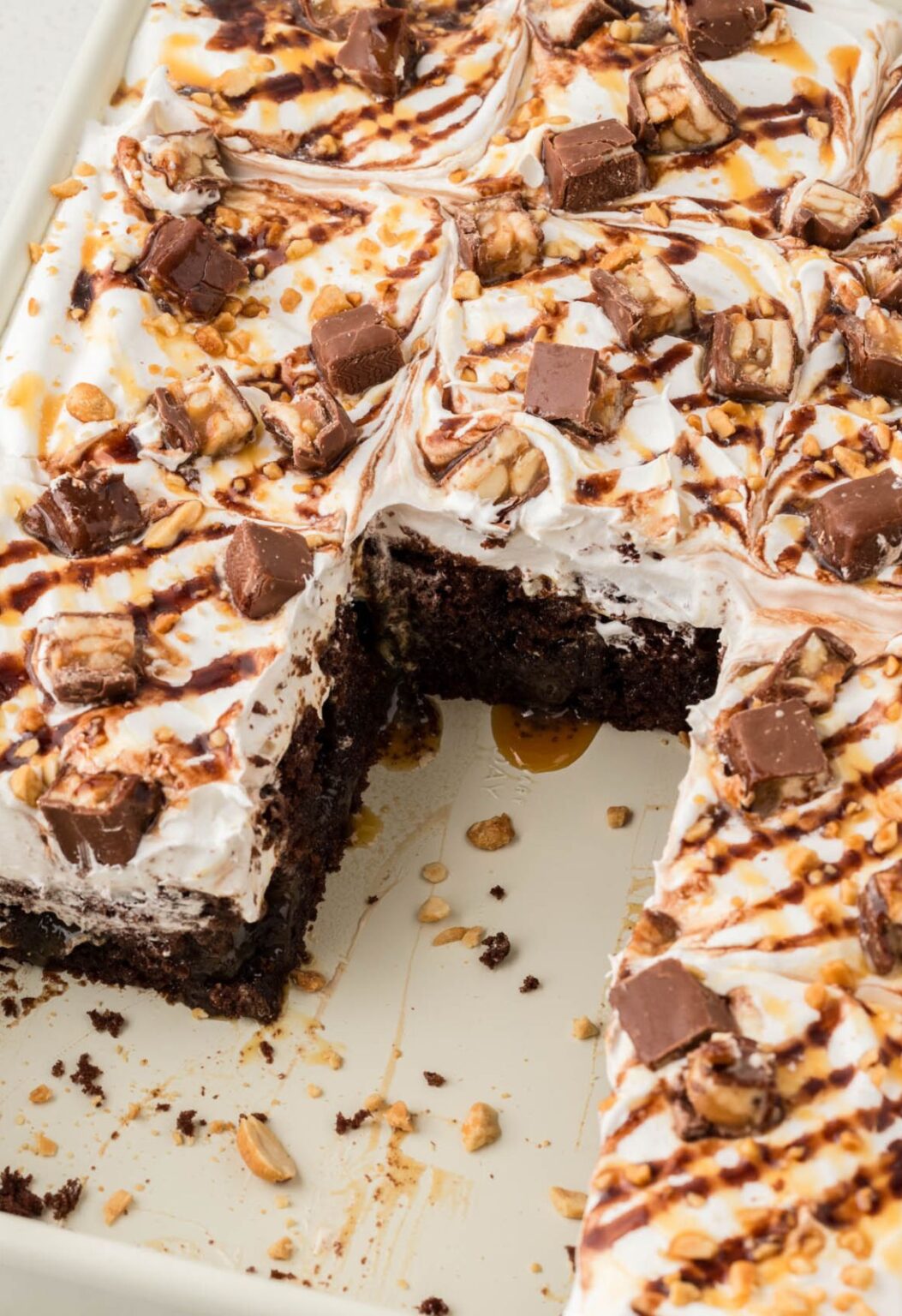 Easy Snickers Poke Cake - Together as Family