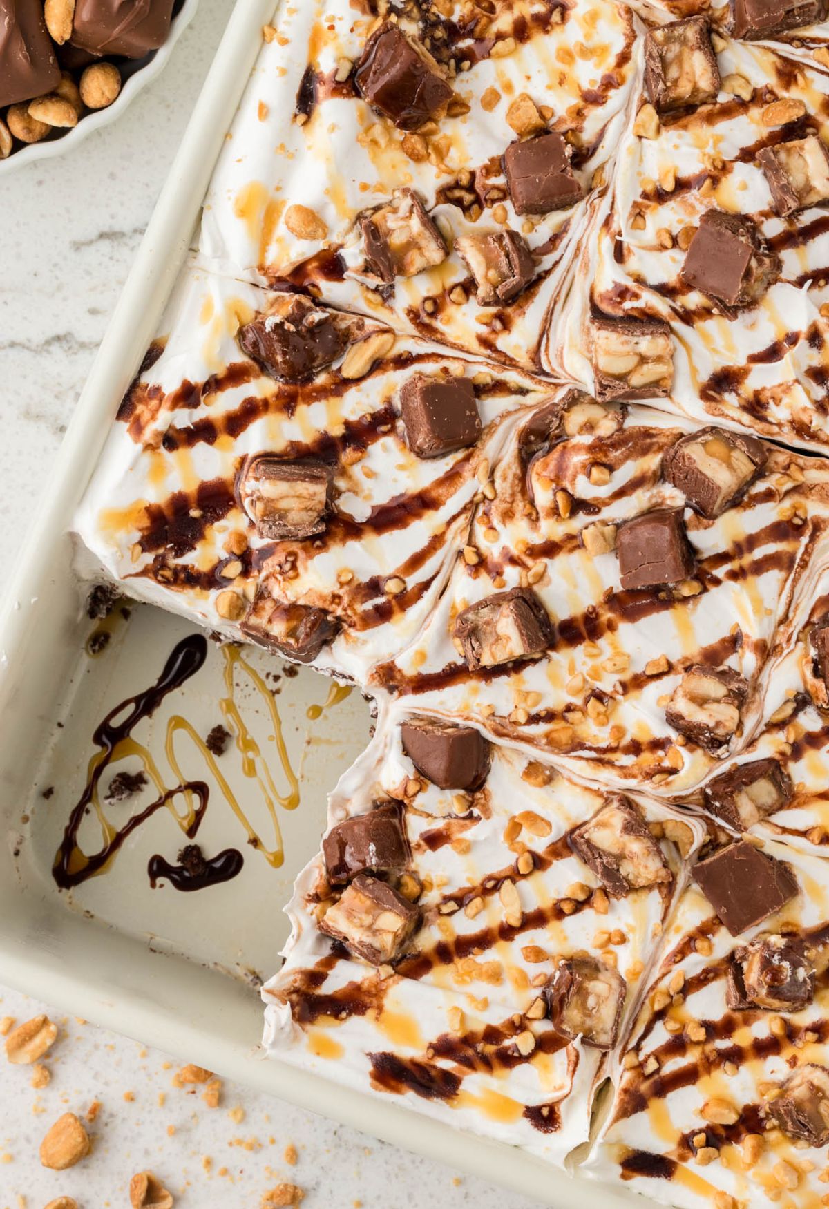 Easy Snickers Poke Cake - Together as Family