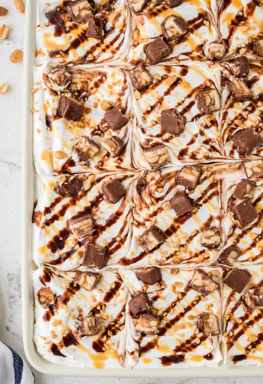 Easy Snickers Poke Cake - Together as Family
