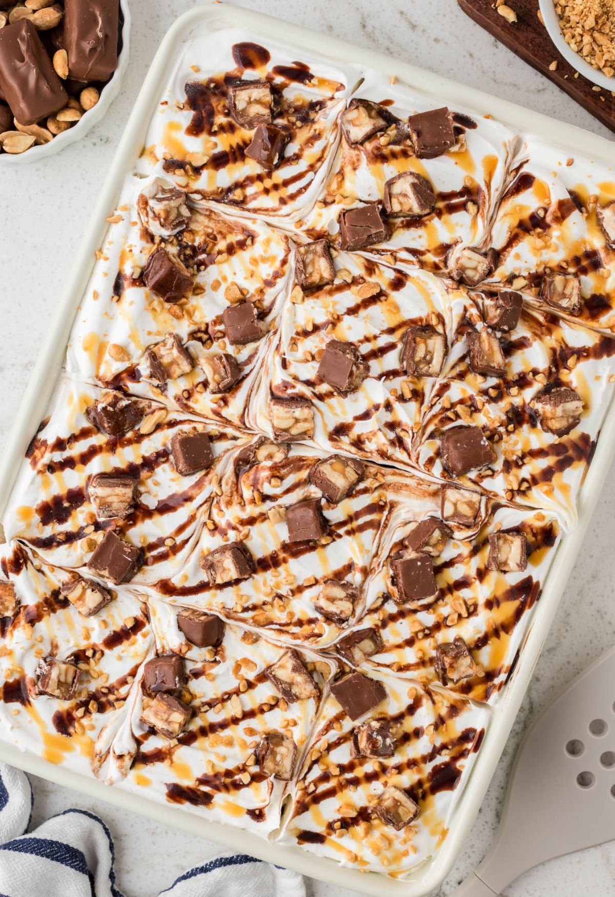 Easy Snickers Poke Cake - Together as Family